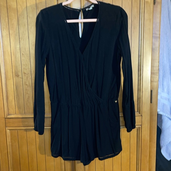 Guess | Pants & Jumpsuits | Guess Black Crossover Romper With Pockets | Poshmark